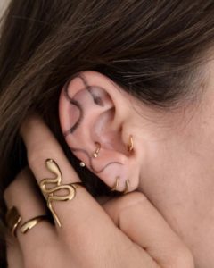 50+ Amazing Ear Tattoos And Ideas That'll Convince You To Get Inked In 2025